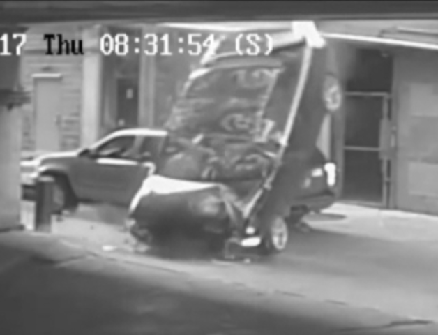 Amazing surveillance video shows car falling 7 stories onto another car ...